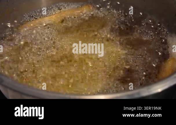 Cooking Crispy French Fries close-up cinematic view. Macro shot of ...