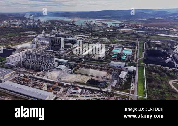 An aerial view shows factories and industrial buildings in a large area ...