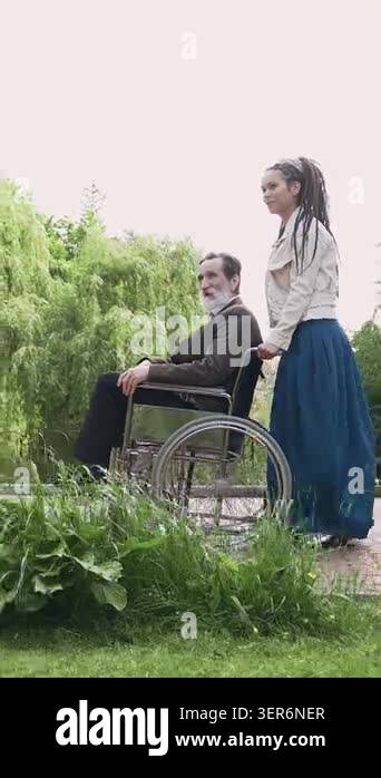 Good-tempered adorable carefree stylish girl with long dreadlocks and ...