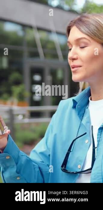 Portrait of happy young smiling woman talking online in a video ...