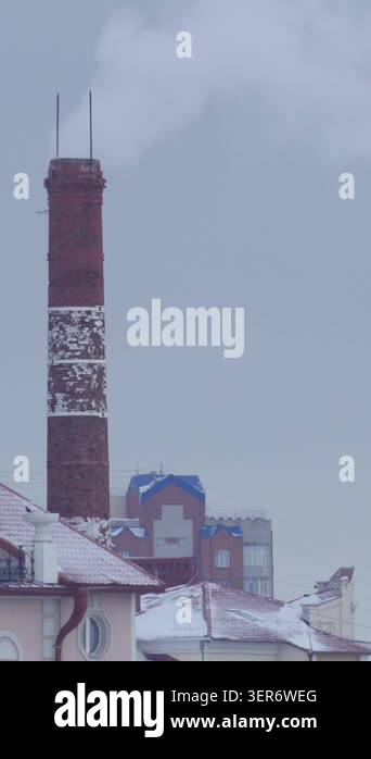 Industrial pipes pollute in the Atmosphere With Smoke, telephoto shot ...