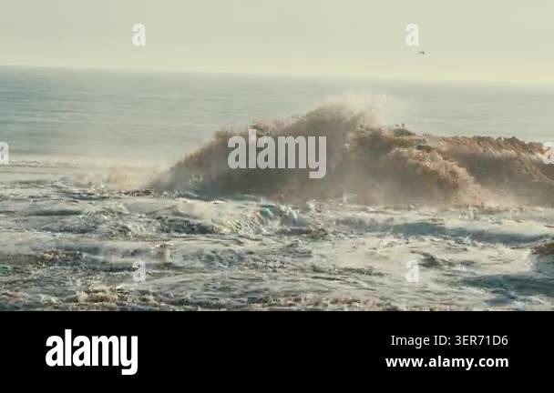 Extreme winter weather showing icy waves and slush forming on a ...