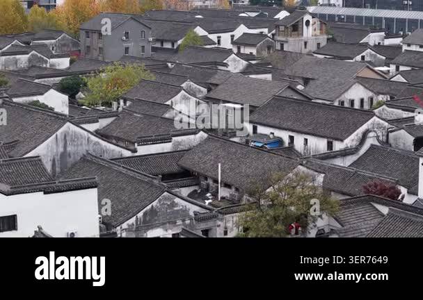Aerial view of Chinese Jiangnan ancient water town rooftops and ...