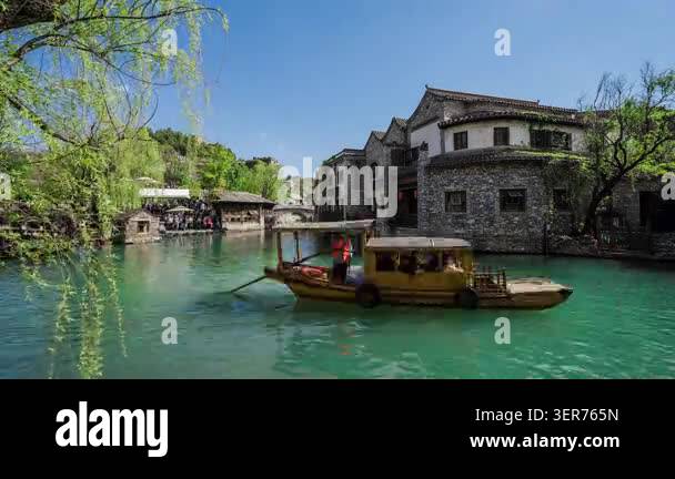 Chinese Jiangnan ancient town timelapse of river and houses Stock Video ...