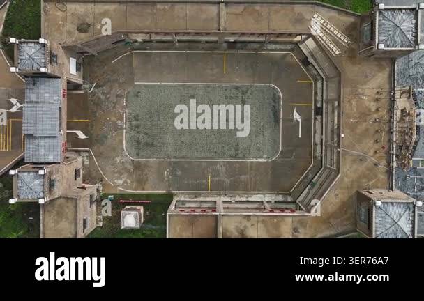 Aerial view of rectangular Tibetan courtyard landmark in Daocheng ...