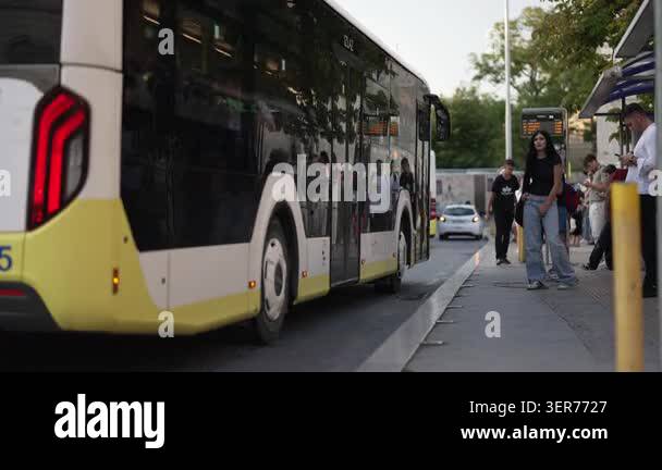 2025.09.12. - Split, Croatia: Commuters at a local bus stop. Editorial ...