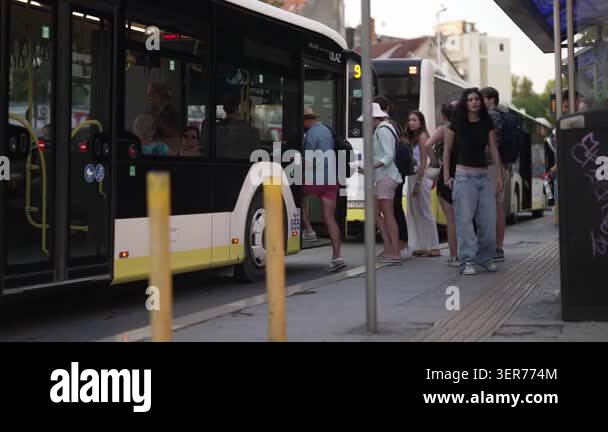 2025.09.12. - Split, Croatia: Commuters at a local bus stop. Editorial ...