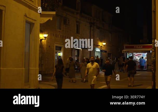 2025.09.12. - Split, Croatia: Tourists exploring the city. Editorial ...