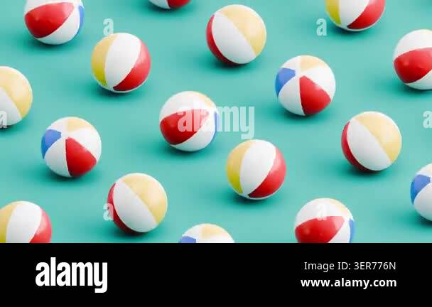 Seamless 3D Animation of Beach Balls Rolling on Blue Background ...