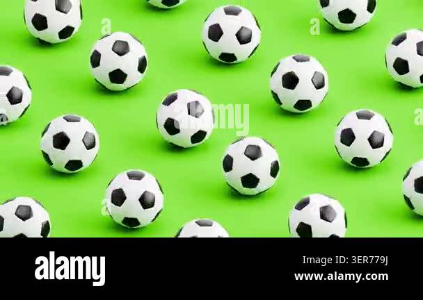 Seamless 3D Animation of Soccer Balls Rolling on Green Background ...