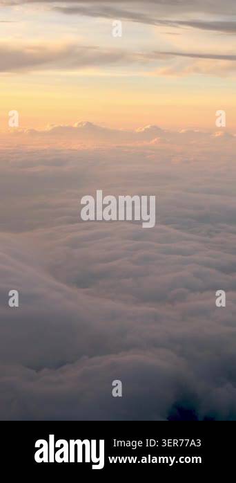 Traveling by air. Wonderful view of the sky and clouds with the sun ...