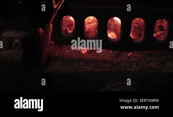 Fire glow in red in wood furnace for house heating Stock Video Footage ...