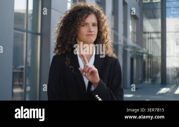 Confident Caucasian business woman shaking finger no not reject ...