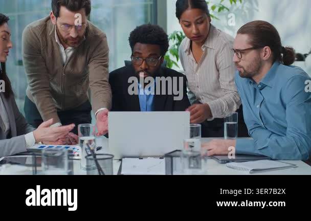 Multiracial business team five diversity managers talk discuss laptop ...