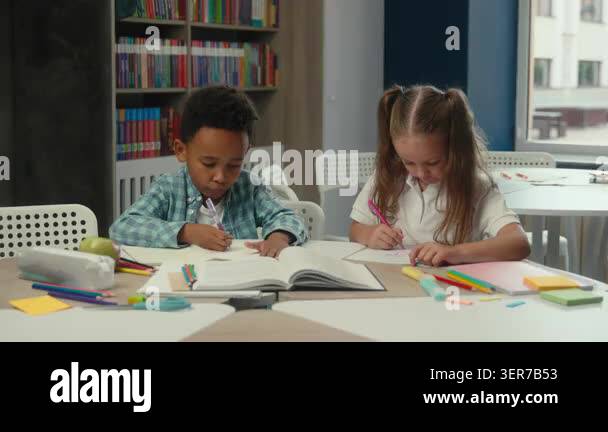 Cute little children multiethnic kids African boy Caucasian girl school ...