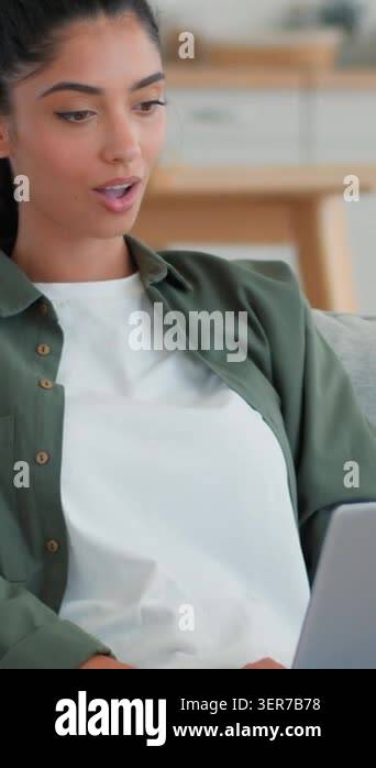 Happy smiling Arabian Indian woman use laptop celebrating win victory ...
