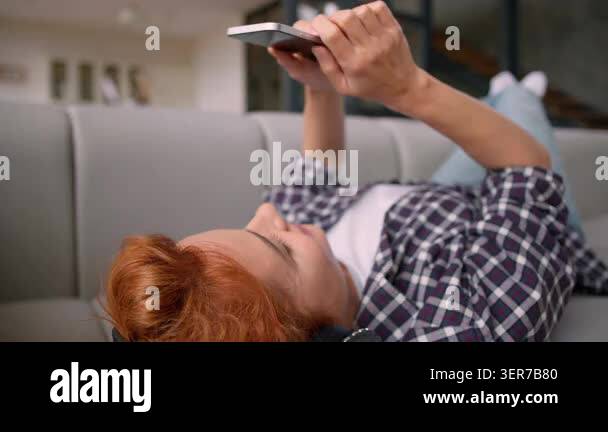 Relaxing Caucasian woman female girl lady at own rent apartment ...