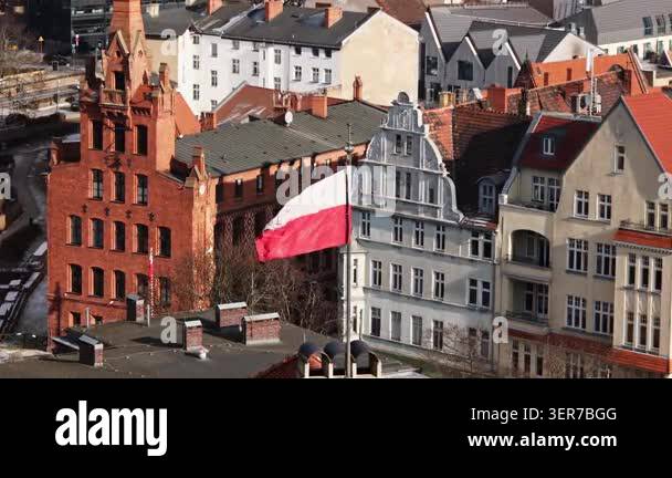 Polish Flag Flying Above Poznan Old Town Skyline, amazing aerial view ...