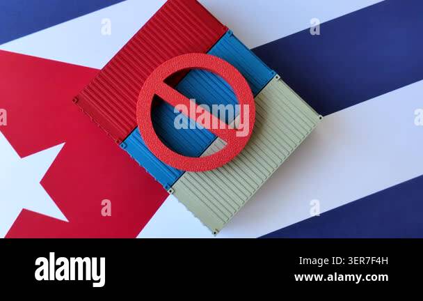 The cargo container ban on the Cuba flag as a conceptual backdrop. The ...