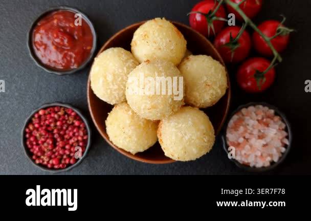 Cheese balls or potato croquettes, golden brown, fried with salt and ...