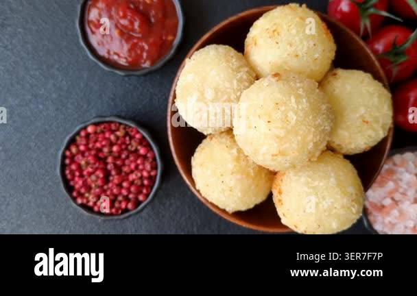 Cheese balls or potato croquettes, golden brown, fried with salt and ...