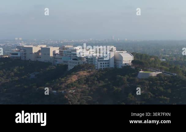 Cinematic aerial movement revealing Getty Center museum architecture on ...