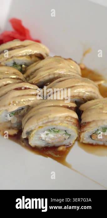 Fresh baked sushi rolls with unagi, shrimp, and cream cheese ...