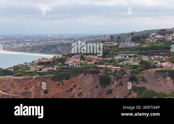 Scenic houses and luxury villas resting on the coastline hills of the ...