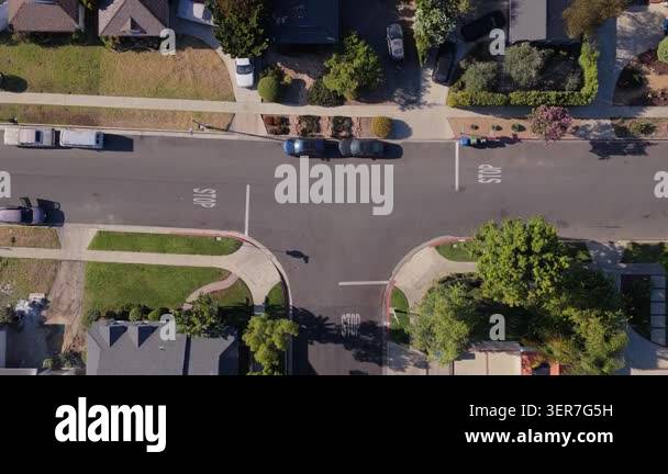 Pedestal up aerial overhead shot of Los Angeles suburban neighborhood ...