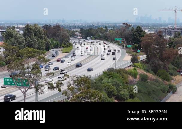 Heavy traffic driving on curving freeway in Los Angeles, California ...