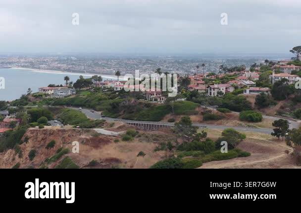 Scenic flight revealing expensive real estate on rugged cliffs of Palos ...