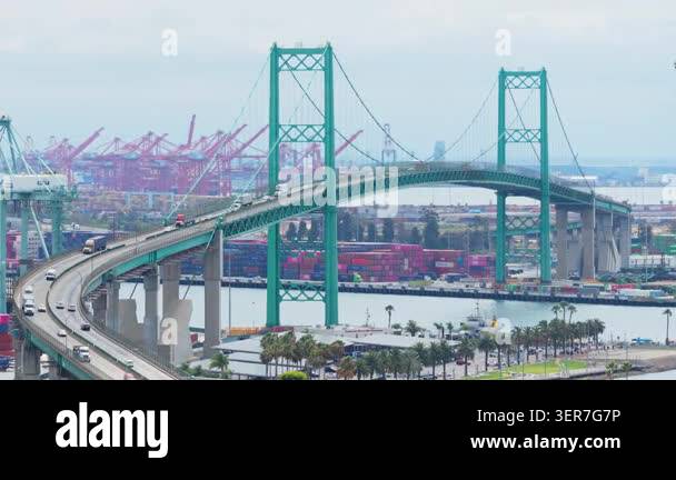 Vincent Thomas Bridge spanning Los Angeles harbor with vehicles ...