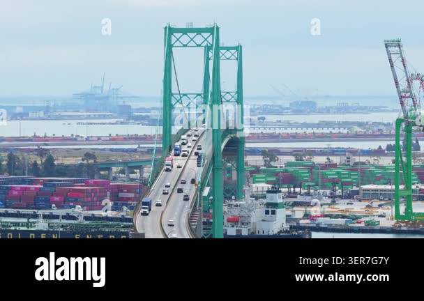 Vincent Thomas Bridge carrying busy traffic with the Port of Los ...