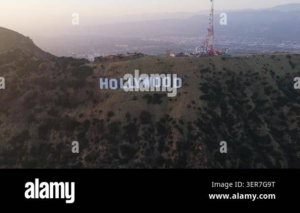 Famous Hollywood sign on Mount Lee during sunset with Los Angeles city ...