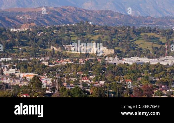 Soaring Hollywood Hills neighborhood revealing Forest Lawn Memorial ...
