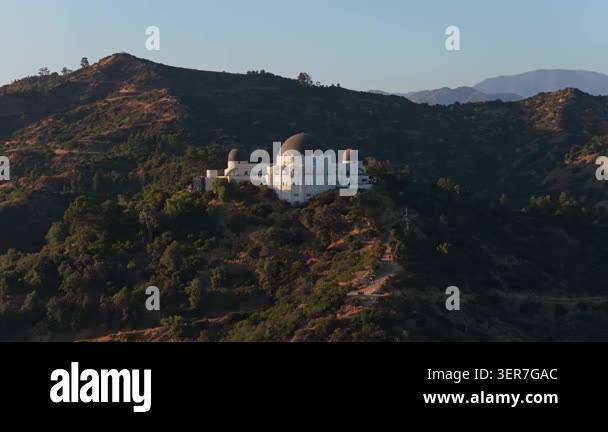 Golden hour light illuminating famous Griffith Observatory in Los ...