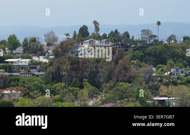 Affluent homes in Hollywood Hills, Los Angeles, with lush greenery ...