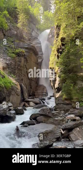 Rosenlauifall waterfall on the alpine stream Reichenbach, Switzerland ...