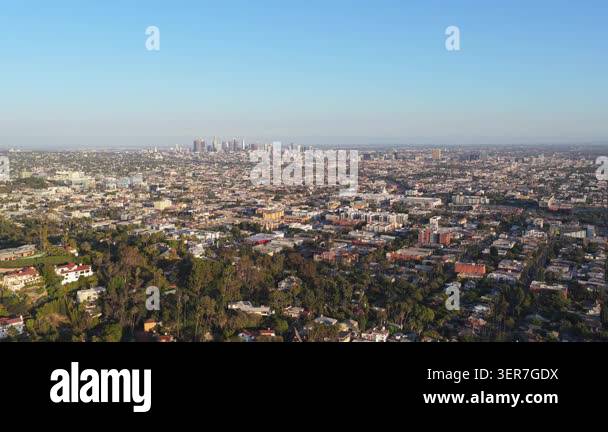 Downtown Los Angeles skyline flying towards urban landscape with ...