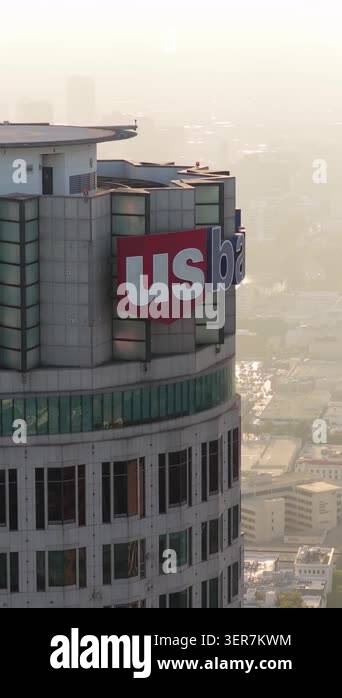 Iconic US Bank Tower skyscraper aerial flying over Los Angeles downtown ...
