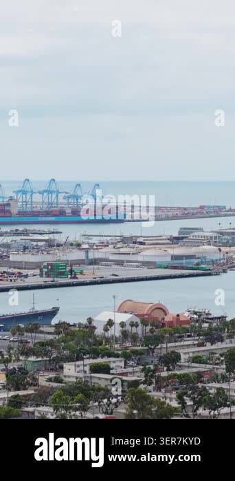 Battleship USS Iowa museum at Port of Los Angeles with container ships ...