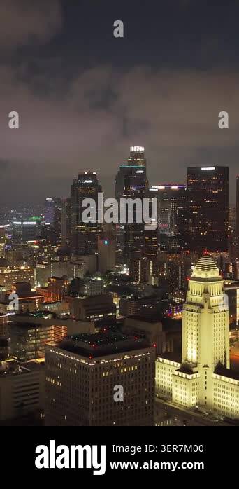 Luminous Los Angeles City Hall and downtown skyline glittering at night ...