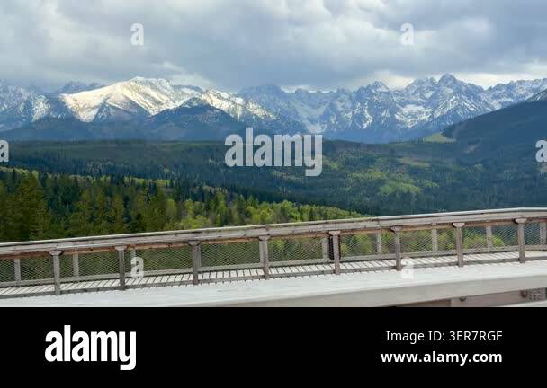 Panoramic wooden walkway with dramatic mountain landscape in High ...