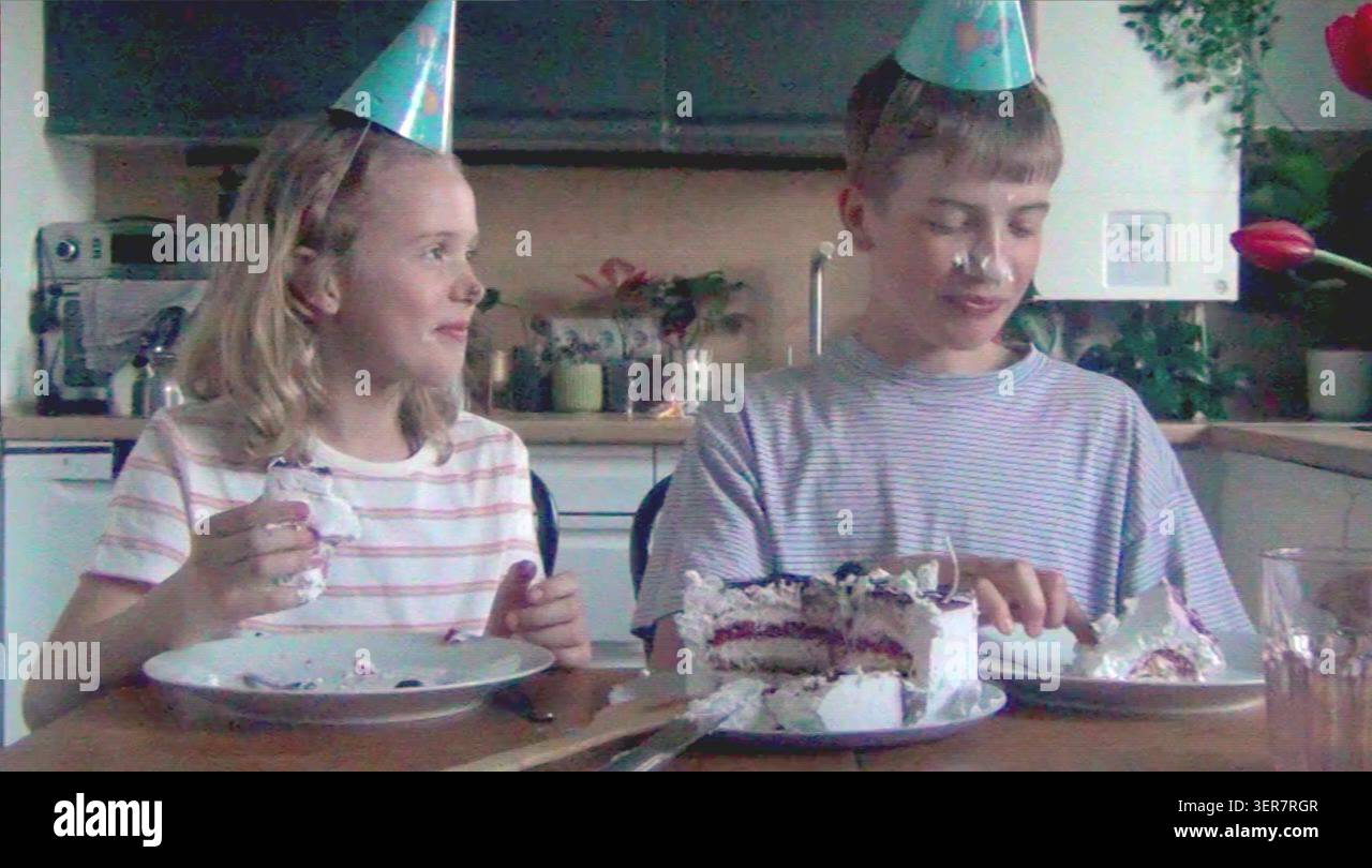 Messy siblings playing with cake during birthday party Stock Video ...