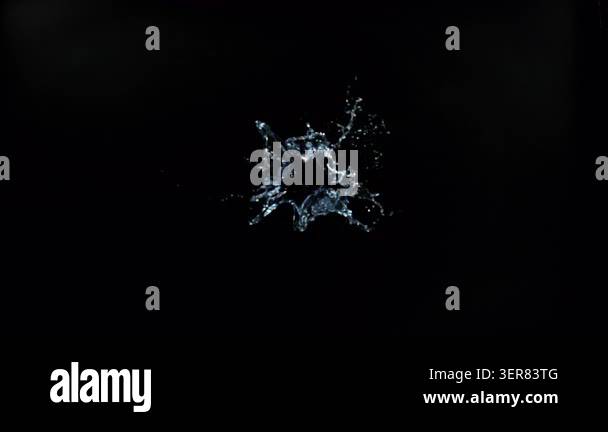 Super Slow Motion of Splashing Water Isolated on Black Background ...