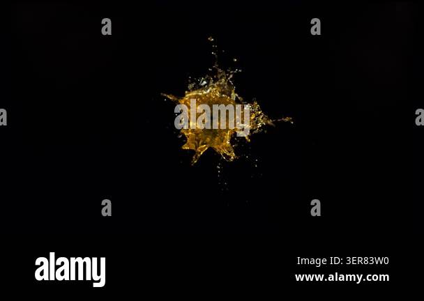 Super Slow Motion Shot of Oil Splash Liquid Isolated on Black ...