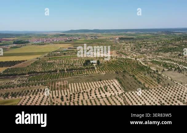 Aerial view of orchards and farmland surrounding rural village Stock ...
