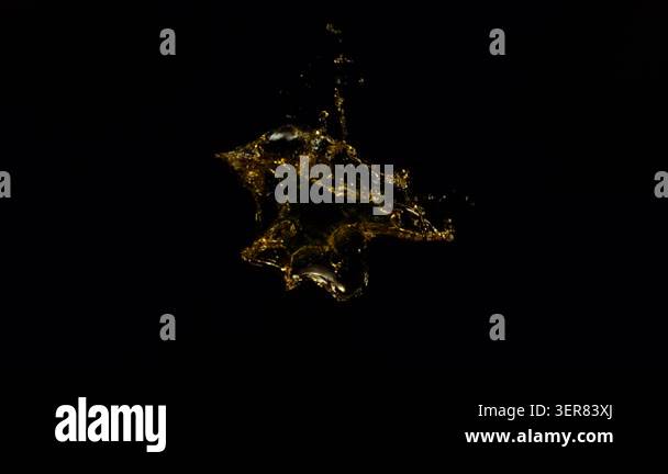 Super Slow Motion Shot of Oil Splash Liquid Isolated on Black ...