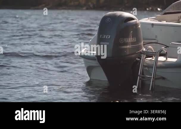 Asikkala, Finland - May 2, 2026 - Boat with a 130 hp Yamaha outboard ...