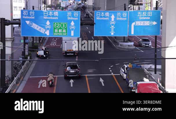 A cityscape of traffic jam at the downtown street in Ikejiri Tokyo ...